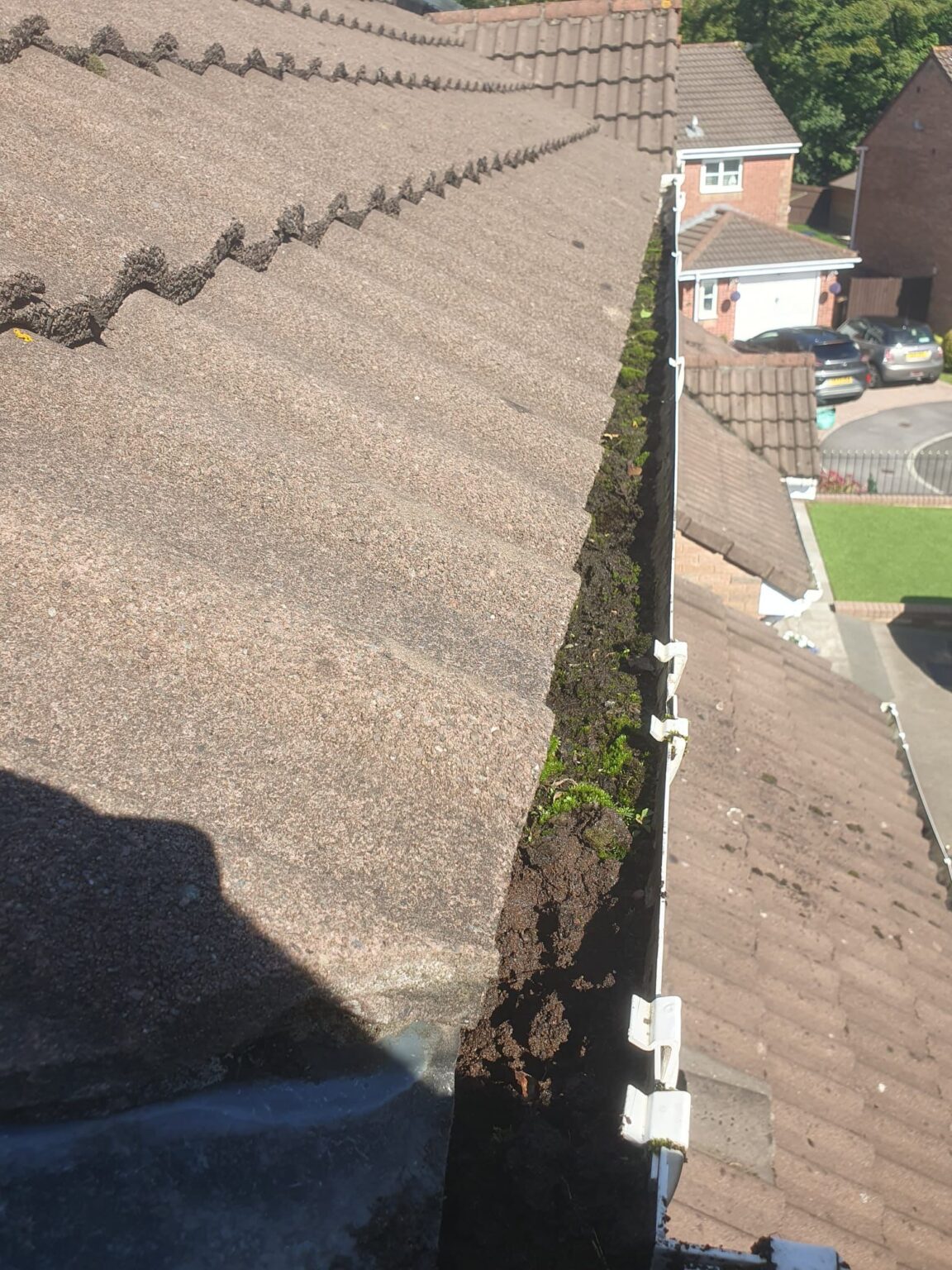 Gutter Cleaning Cardiff | Dragon Shield Roofing South Wales 🏘️